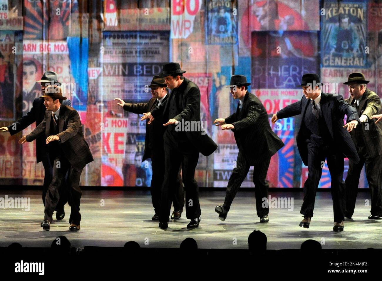 The cast of 'Bullets Over Broadway' performs on stage at the 68th ...