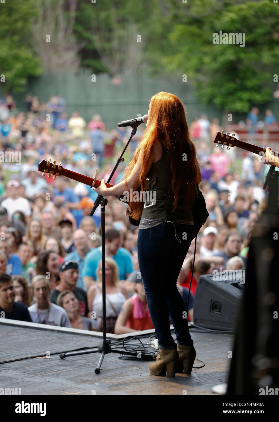 Up and coming singer-songwriter Daisy Mallory performs as she opens for ...