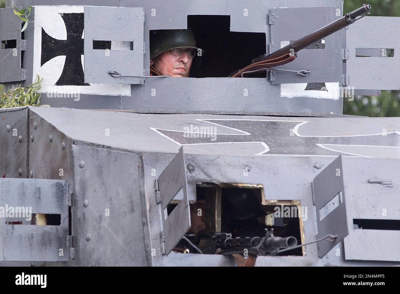 Members of historic clubs wearing WWI era uniforms take part in a ...
