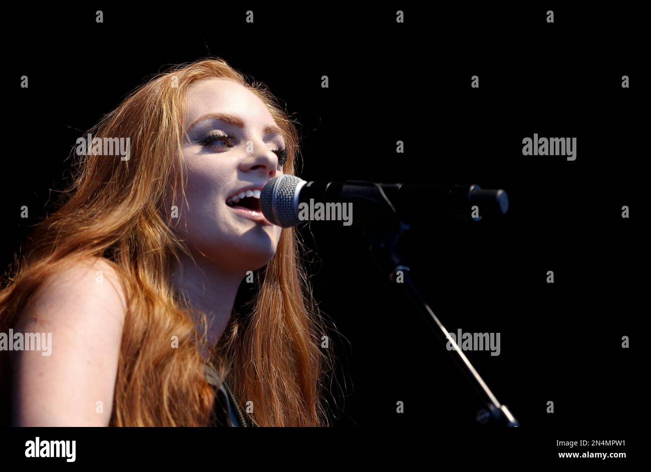 Up and coming singer-songwriter Daisy Mallory performs as she opens for ...