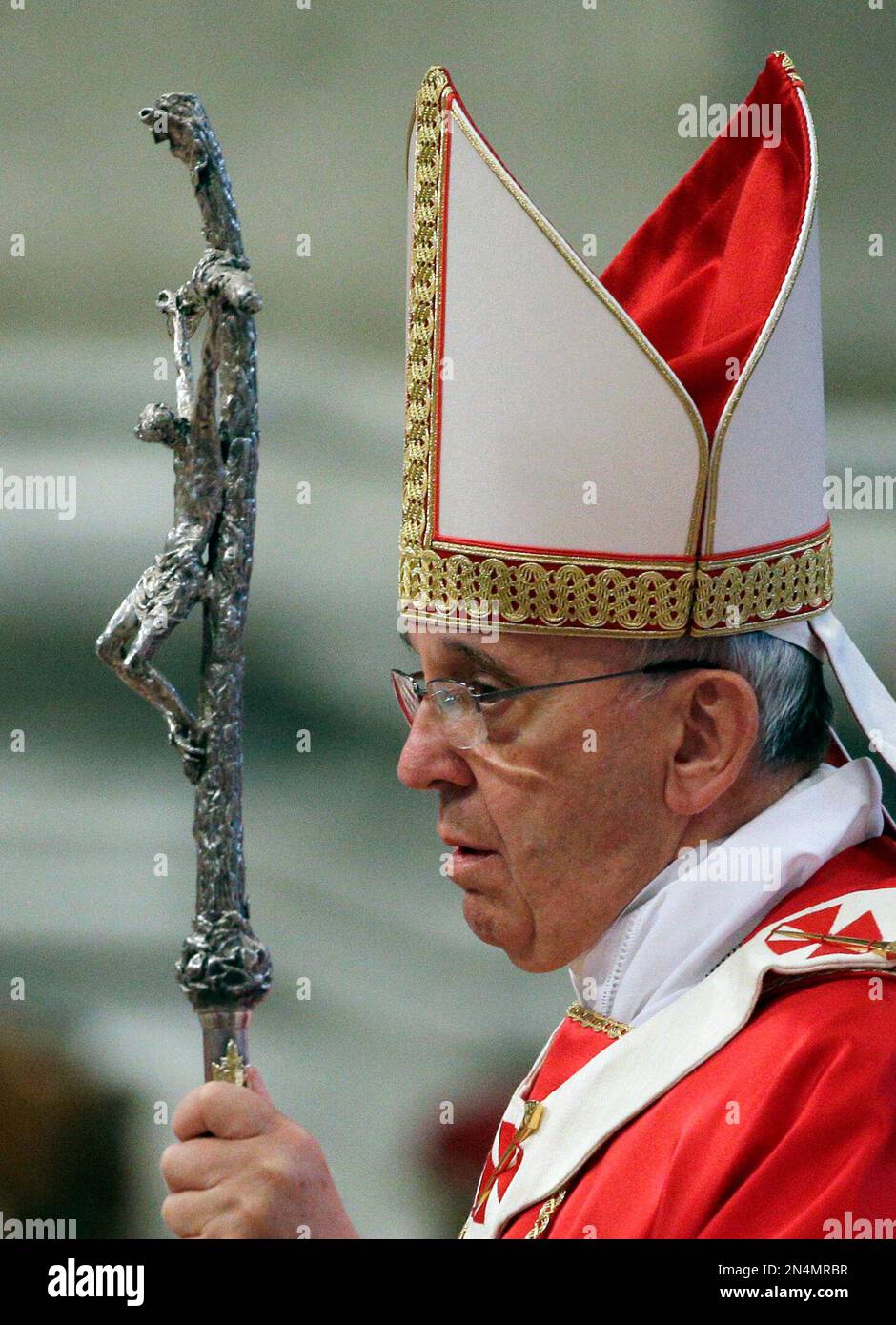 Pope Francis walks with his pastoral staff as he celebrates a mass of ... Pope Francis walks with his pastoral staff as he celebrates a mass of ...