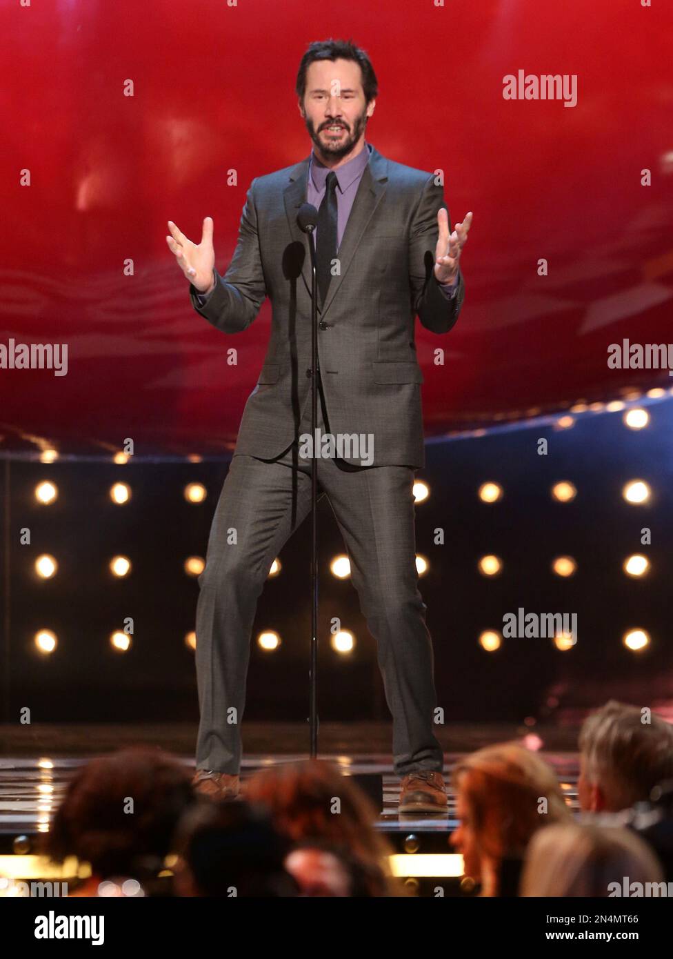 Keanu Reeves presents the decade of hotness award onstage at the Guys ...