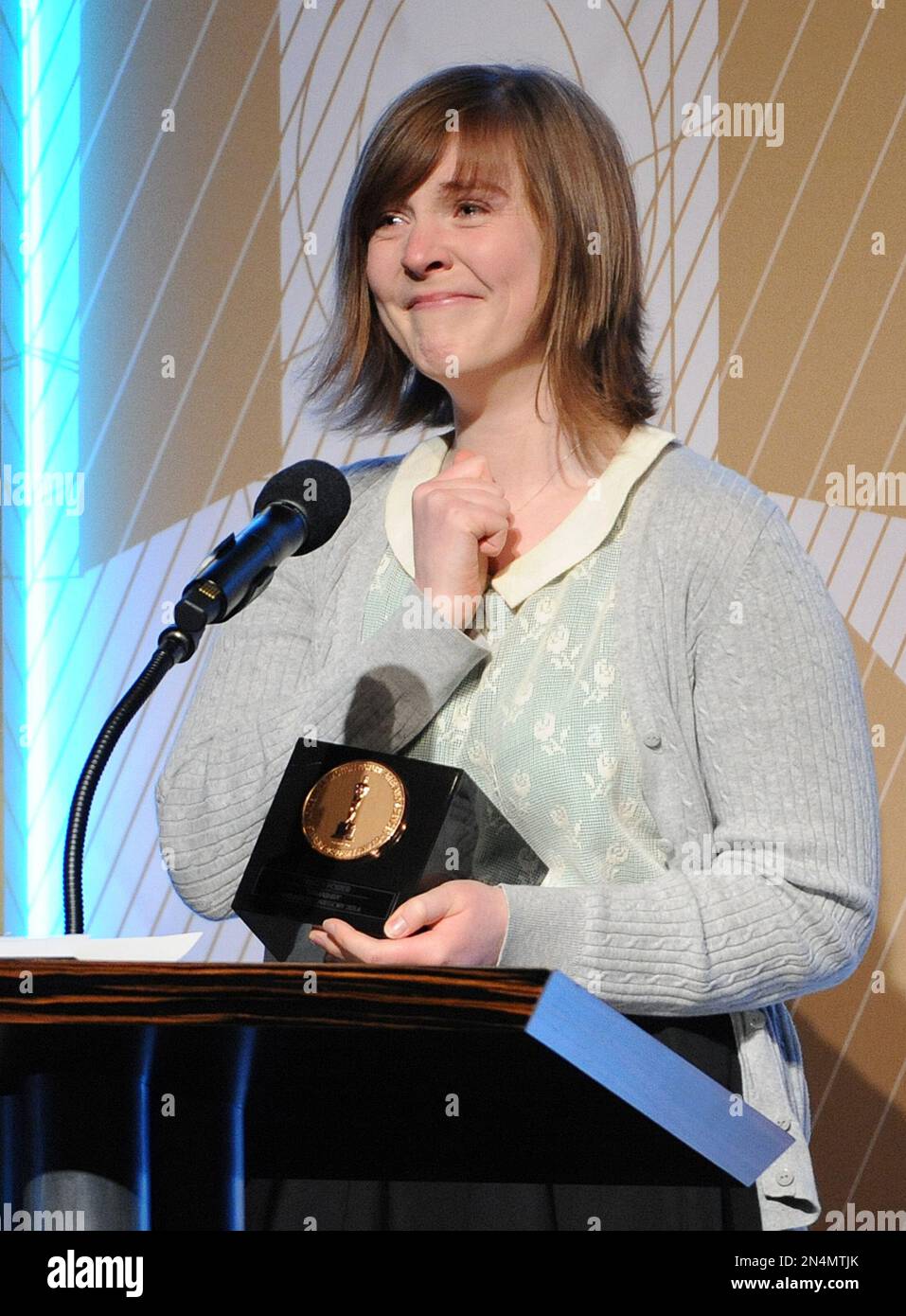 Hayley Foster of Loyola Marymount University accepts the Bronze Medal ...
