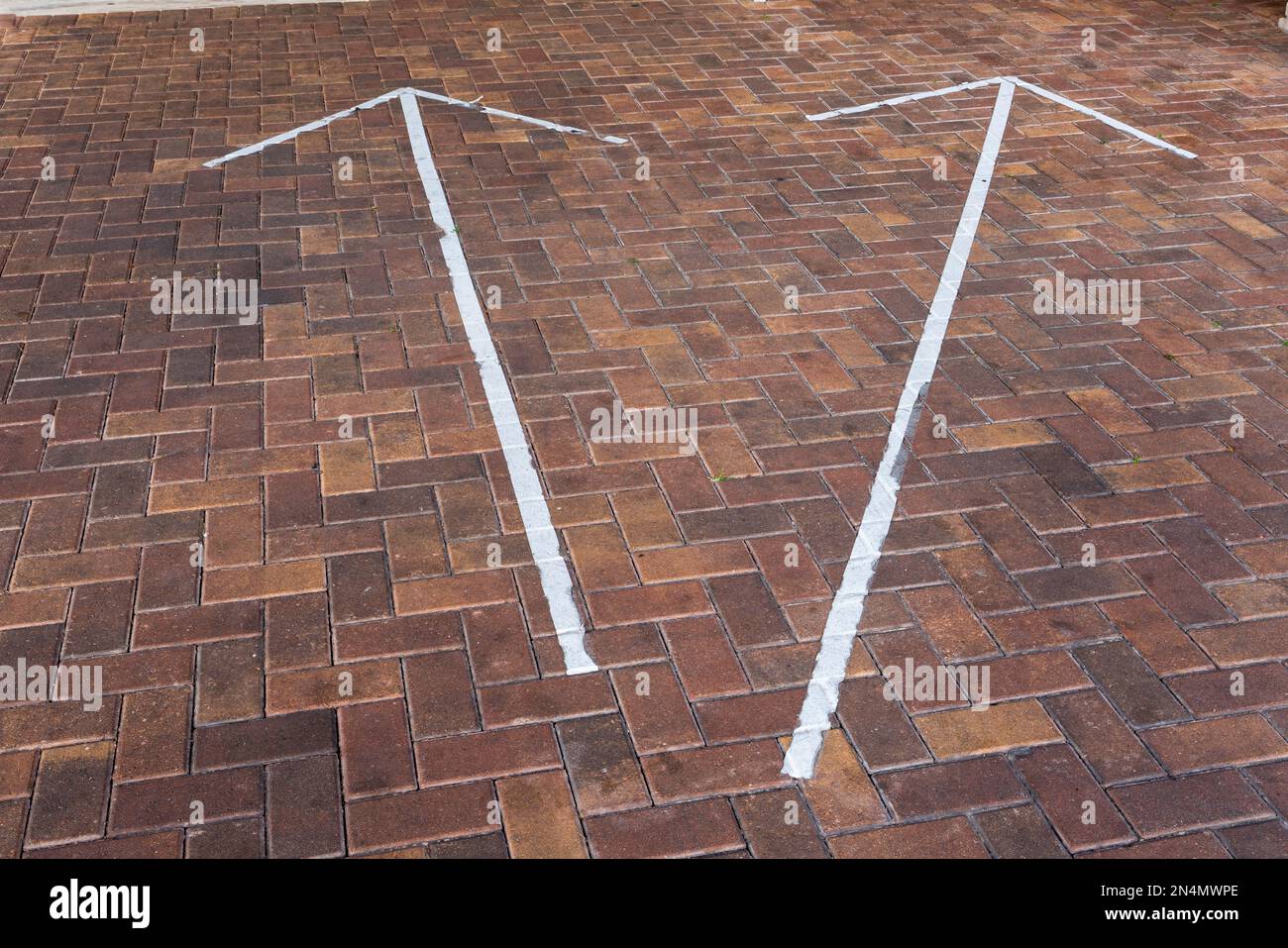 Photo of two pointing arrows Stock Photo - Alamy