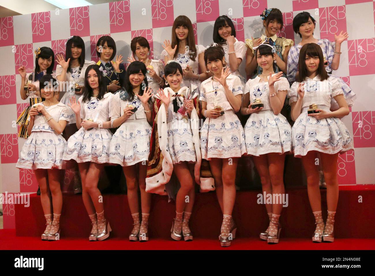 The top 15 members of Japan’s all-girl pop idol group AKB48, from top ...