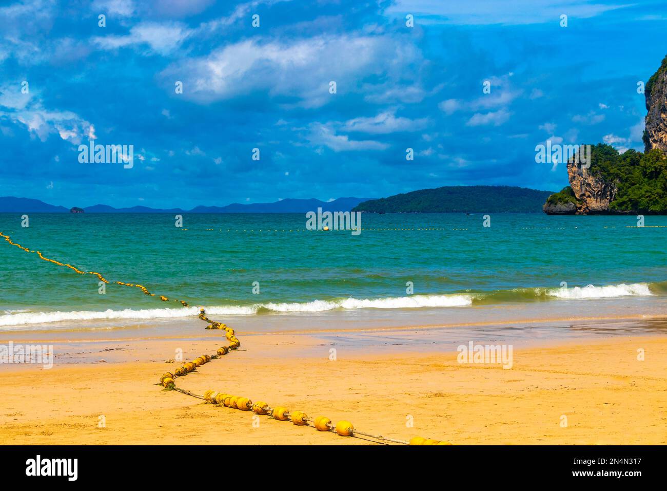 Beautiful famous beach lagoon between limestone rocks and turquoise water on Railay West Beach ...