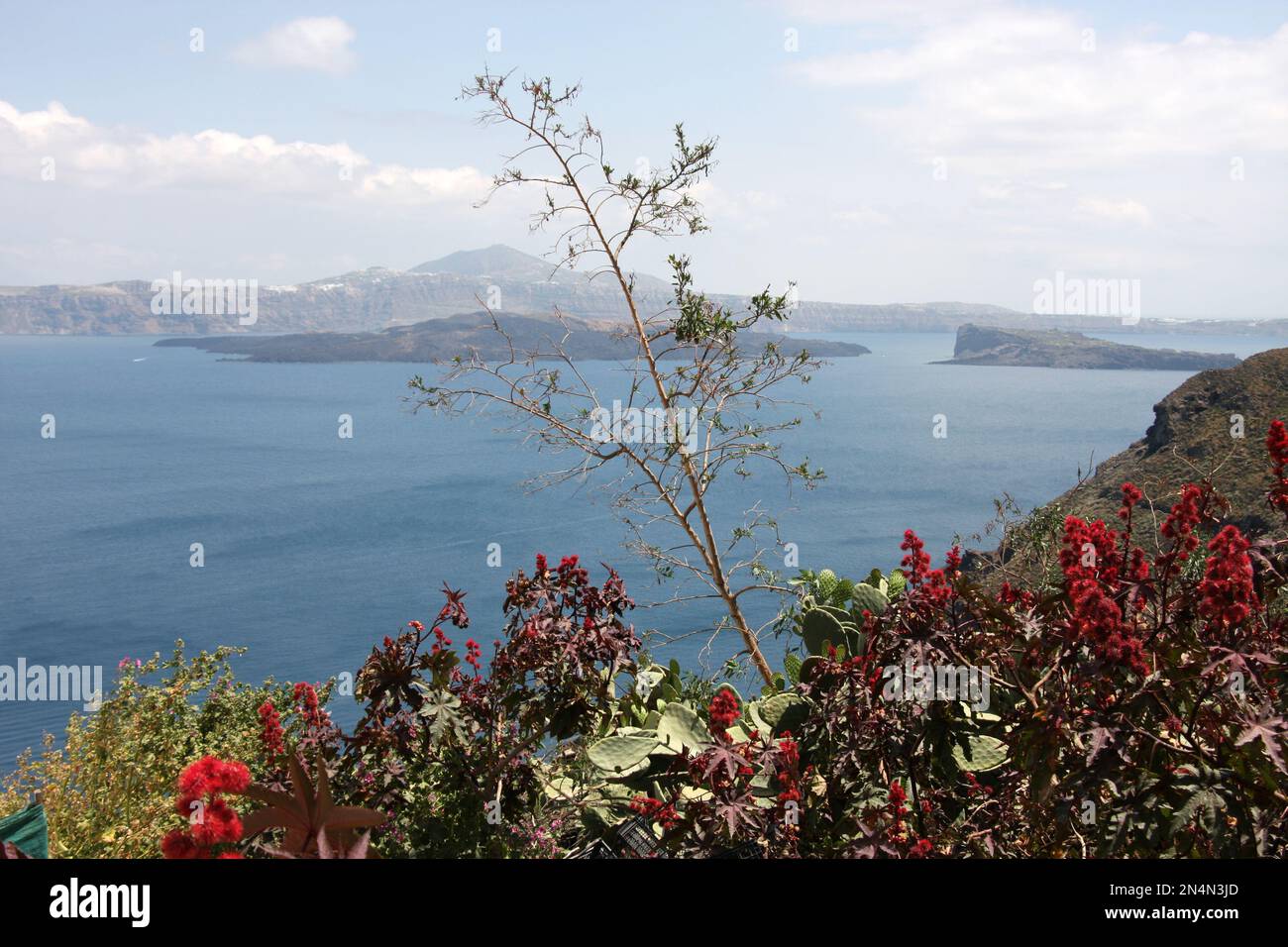 A view from Manolas village on Thirasia looking across the caldera to ...