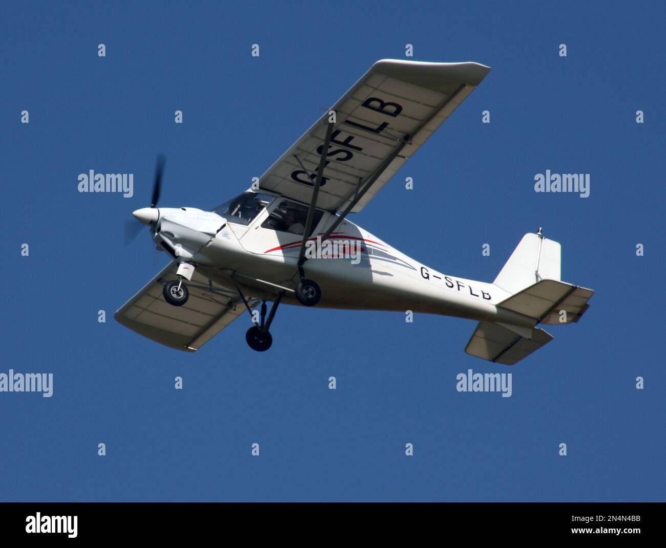 An Ikarus C-42 FB80 departs Sandown airfield Isle of Wight UK Stock ...
