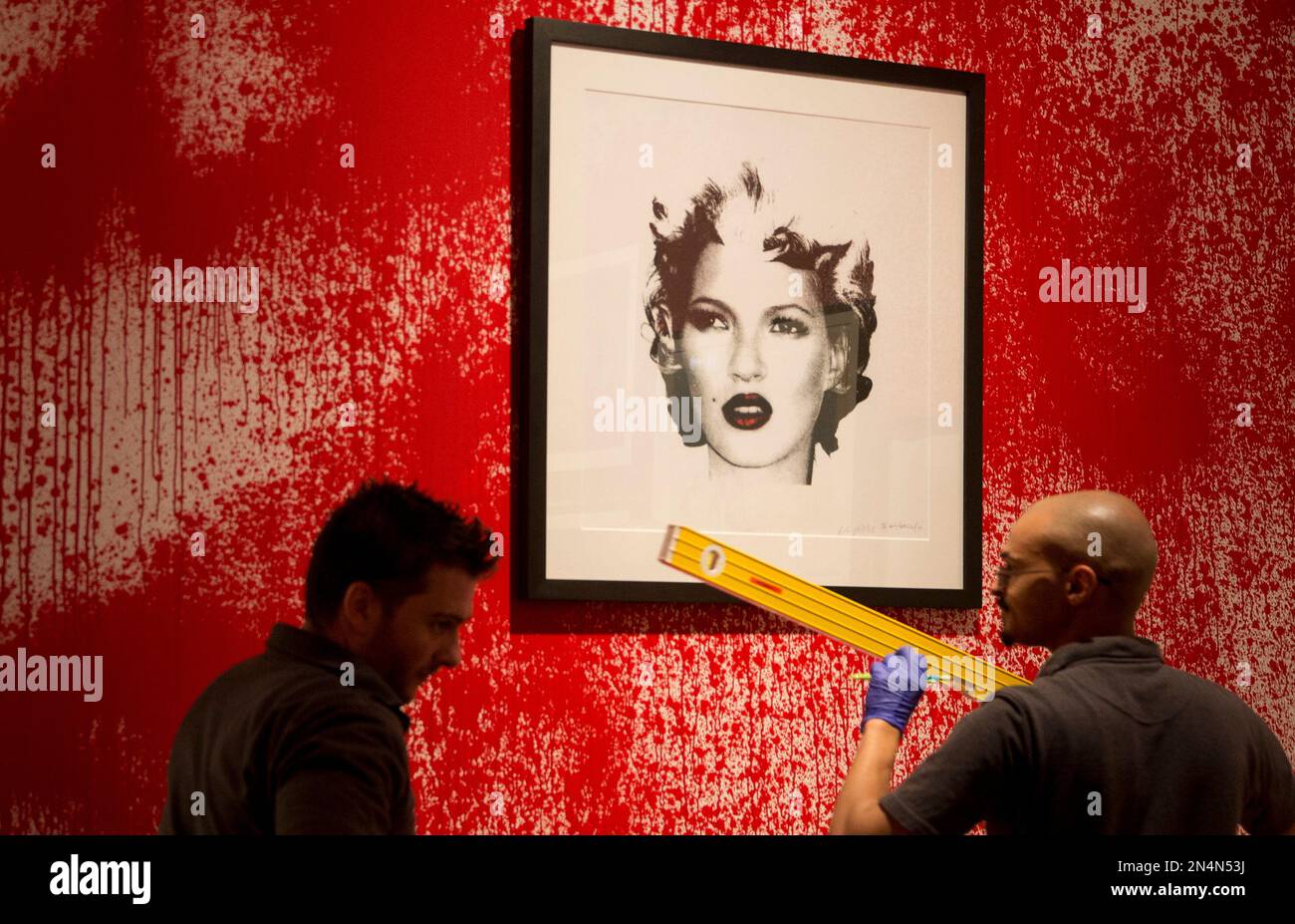 Sotheby's employees organise the positioning of art work by British ...