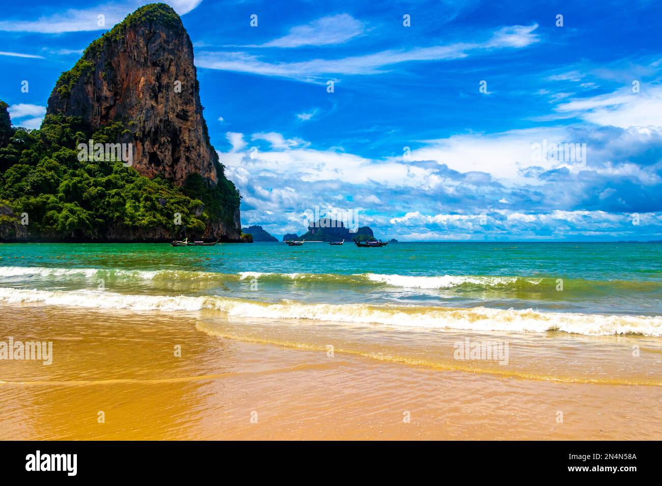 Beautiful famous beach lagoon between limestone rocks and turquoise water on Railay West Beach ...