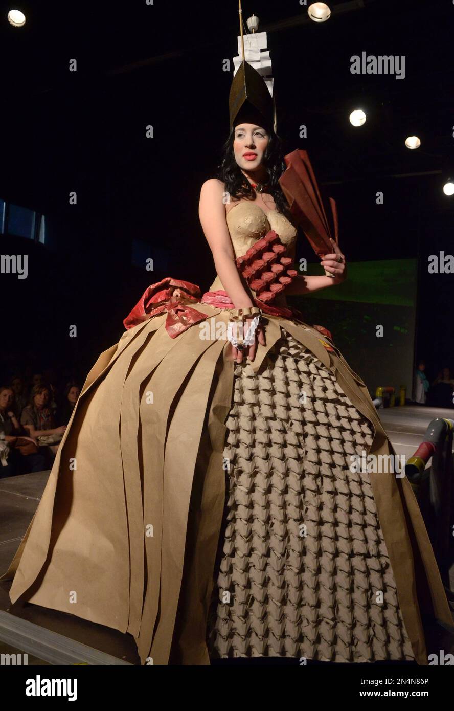 A model presents a creation during Trash Fashion Show in Macedonia's ...