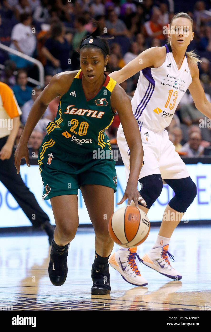 Seattle Storm's Camille Little (20) dribbles past Phoenix Mercury's ...