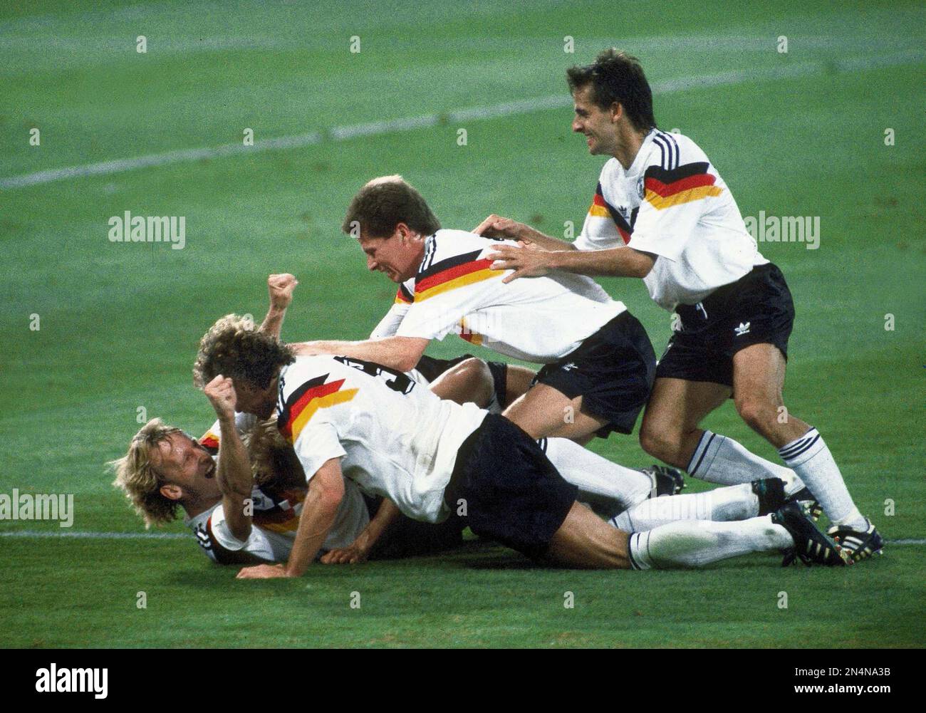 FILE - In this July 8, 1990 file photo, Germany players celebrate after ...