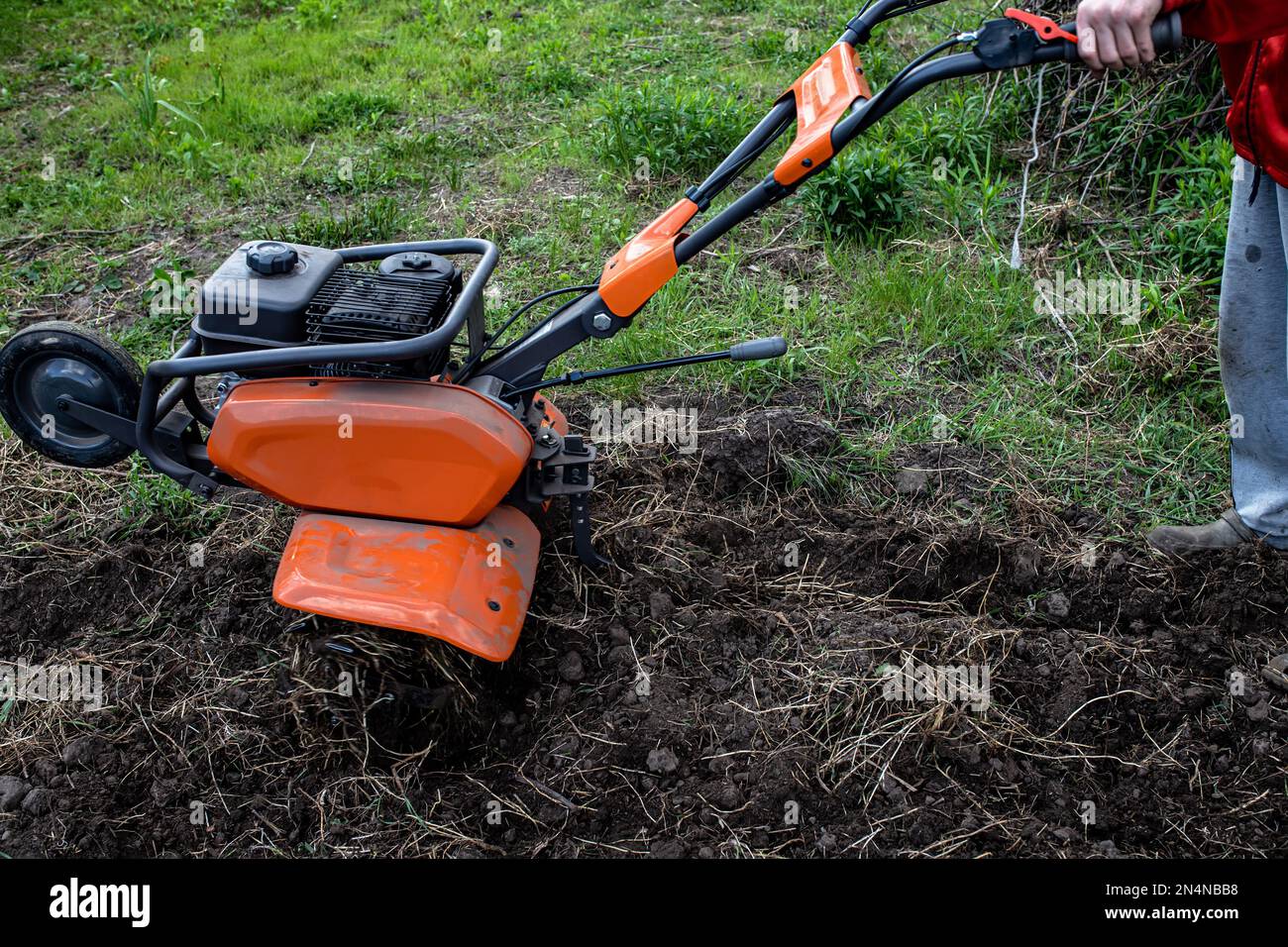 Soil before and after treatment with a cultivator. The soil plowed by ...