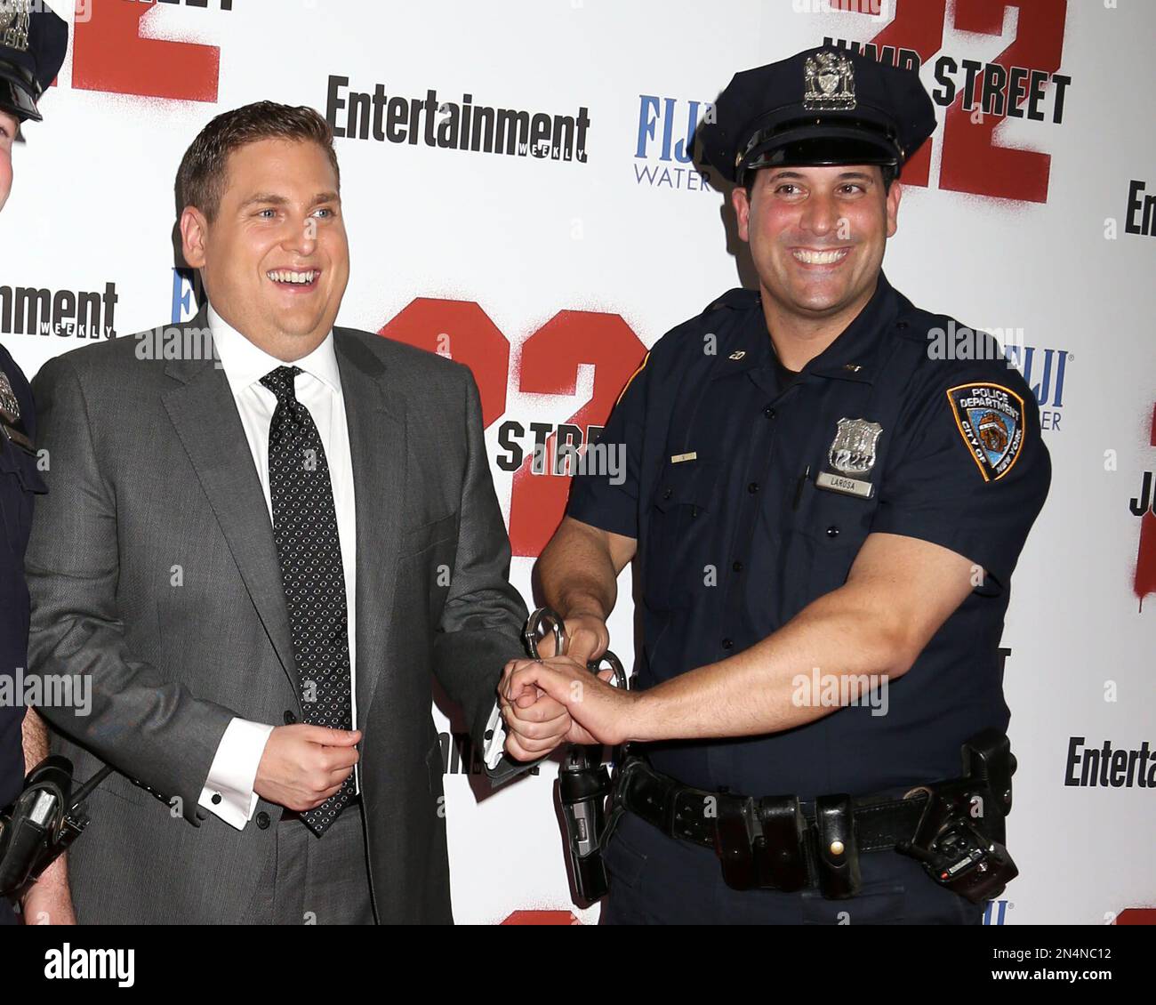 Actor Jonah Hill poses with NYPD officers at the premiere of "22 Jump ...
