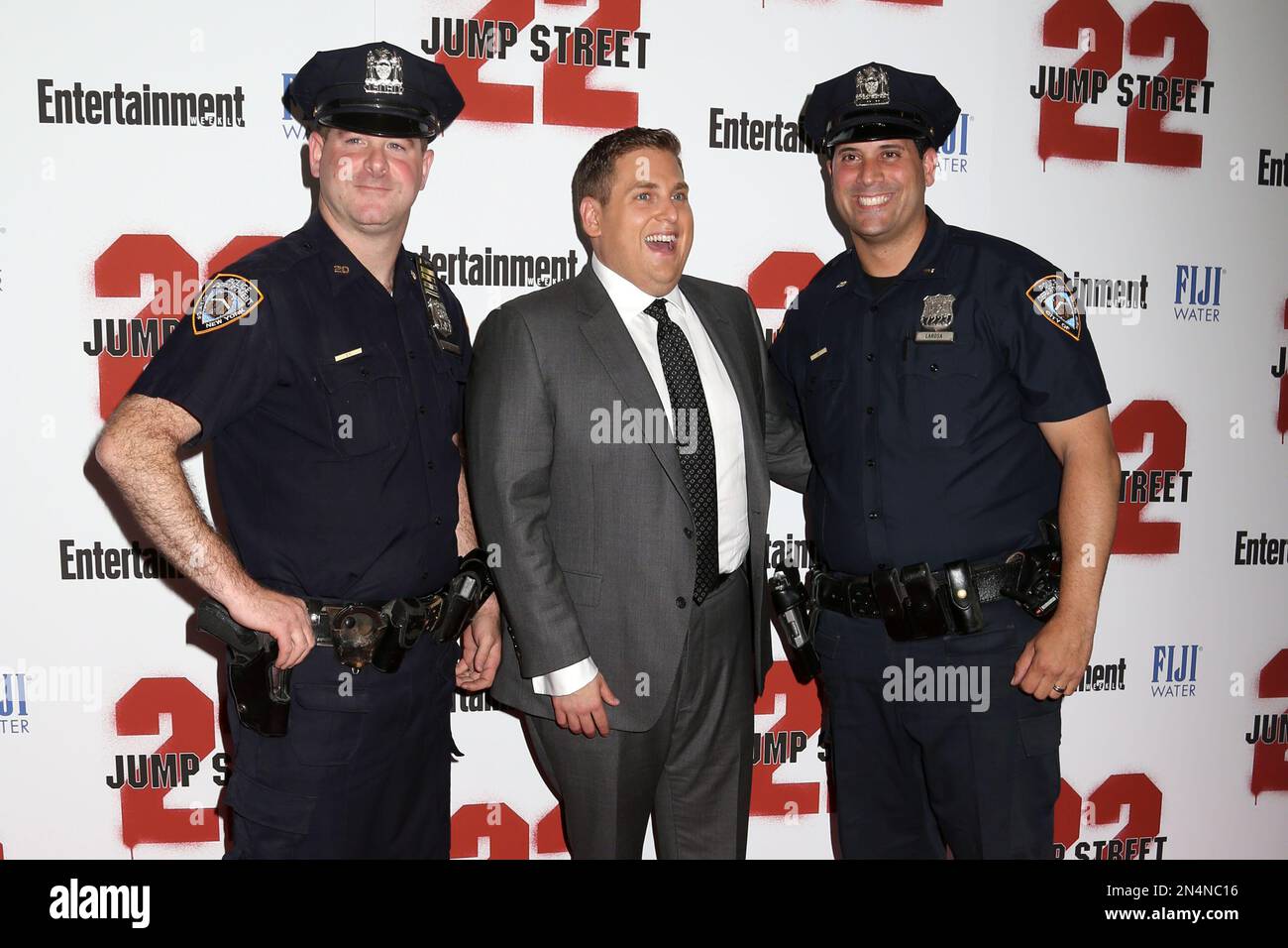 Actor Jonah Hill poses with NYPD officers at the premiere of "22 Jump ...