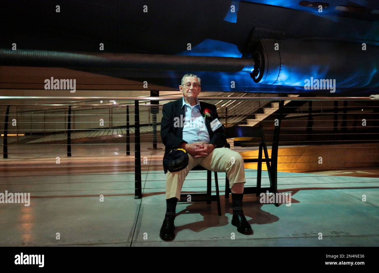 World War II veteran Colin Doig, of Sisterville, W. Va., sits by the ...