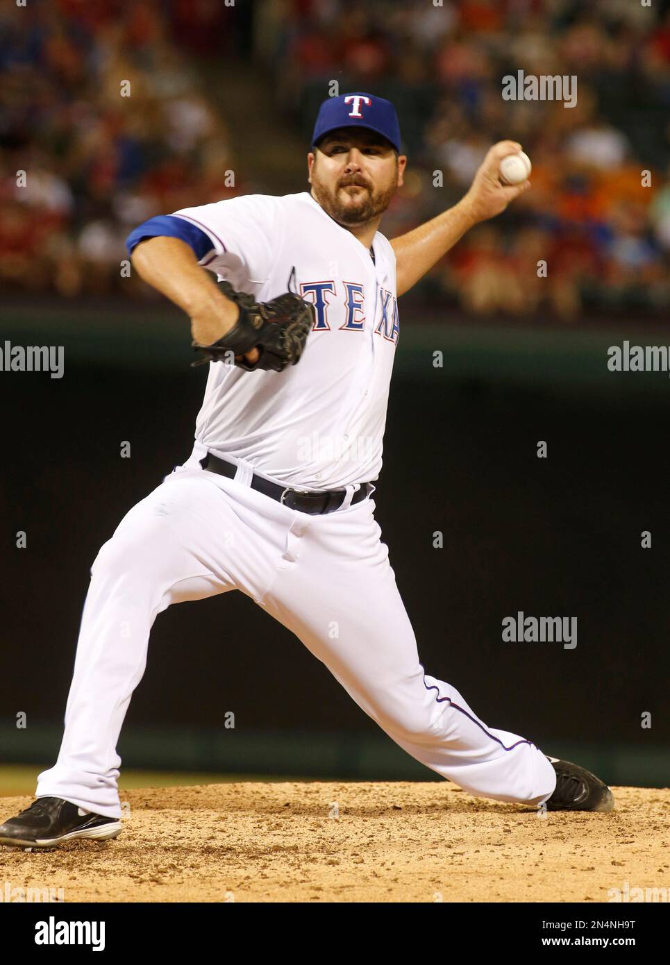 Texas Rangers pitcher Joe Saunders throws a pitch during a baseball ...
