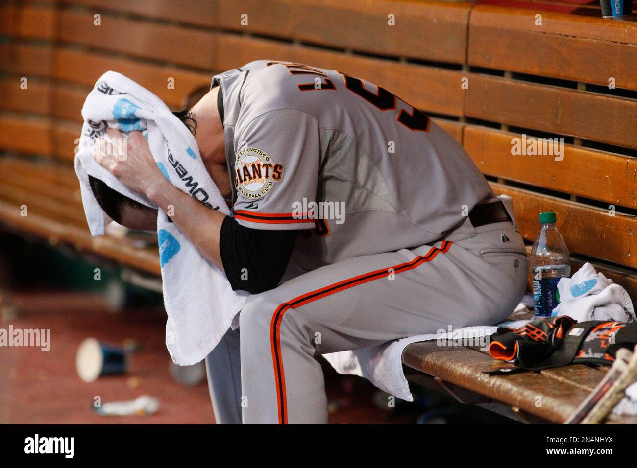 San Francisco Giants pitcher Tim Lincecum sits on the bench after being ...