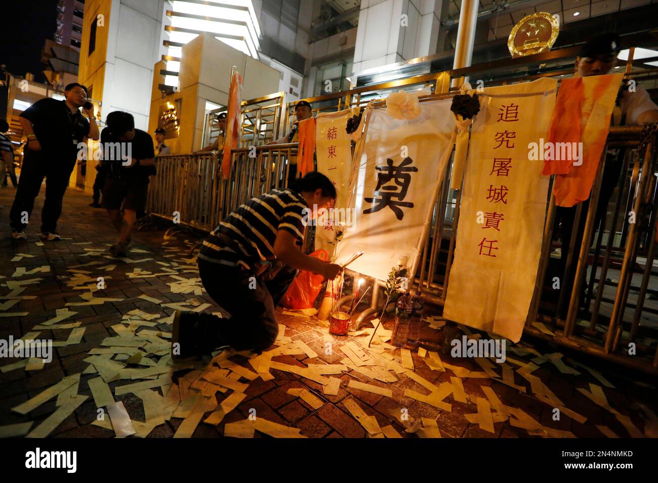 A protester prays for those killed during the China's crackdown on pro ...