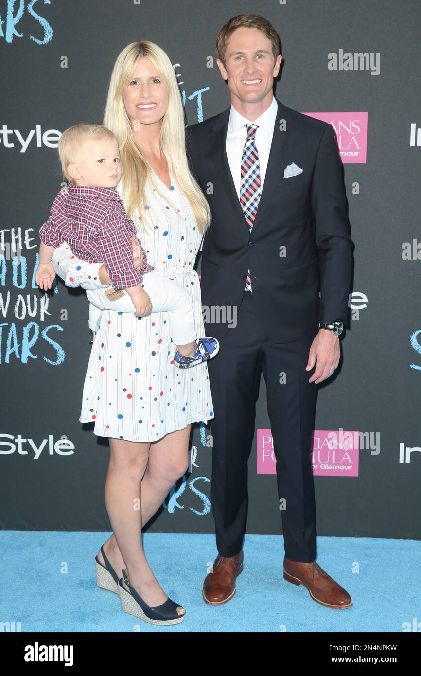 American race car driver Ryan Hunter-Reay, right, his wife Beccy Gordon ...