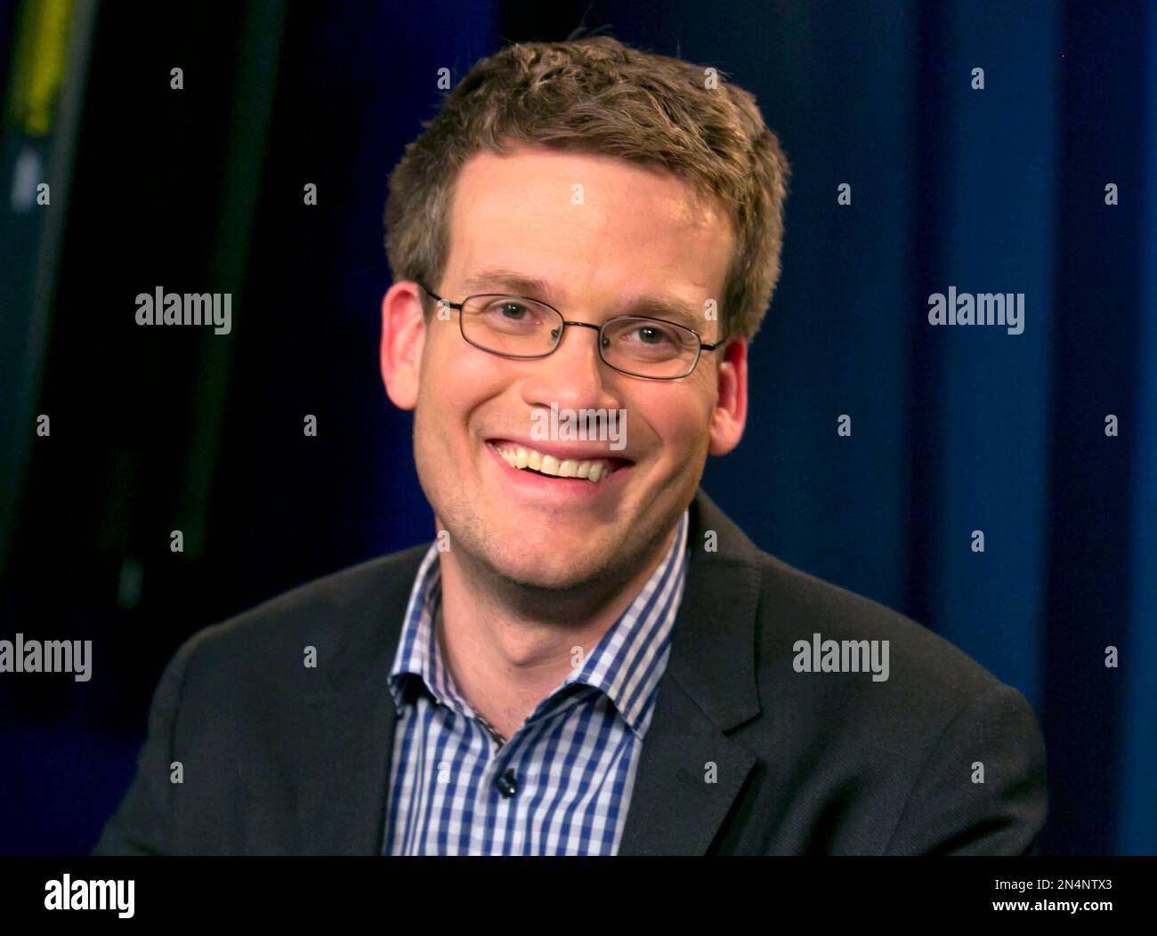 John Green, author of "The Fault in Our Stars," poses during an ...