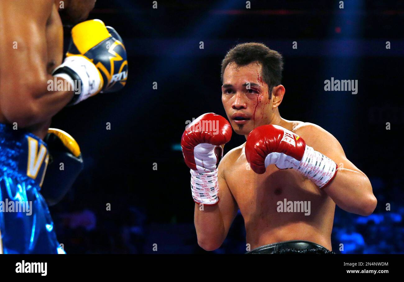 Simpiwe Vetyeka of South Africa, left, fights with Nonito "Filipino ...