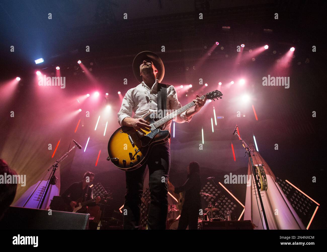 Bear Rinehart, Bo Rinehart and Seth Bolt with NEEDTOBREATHE performing ...
