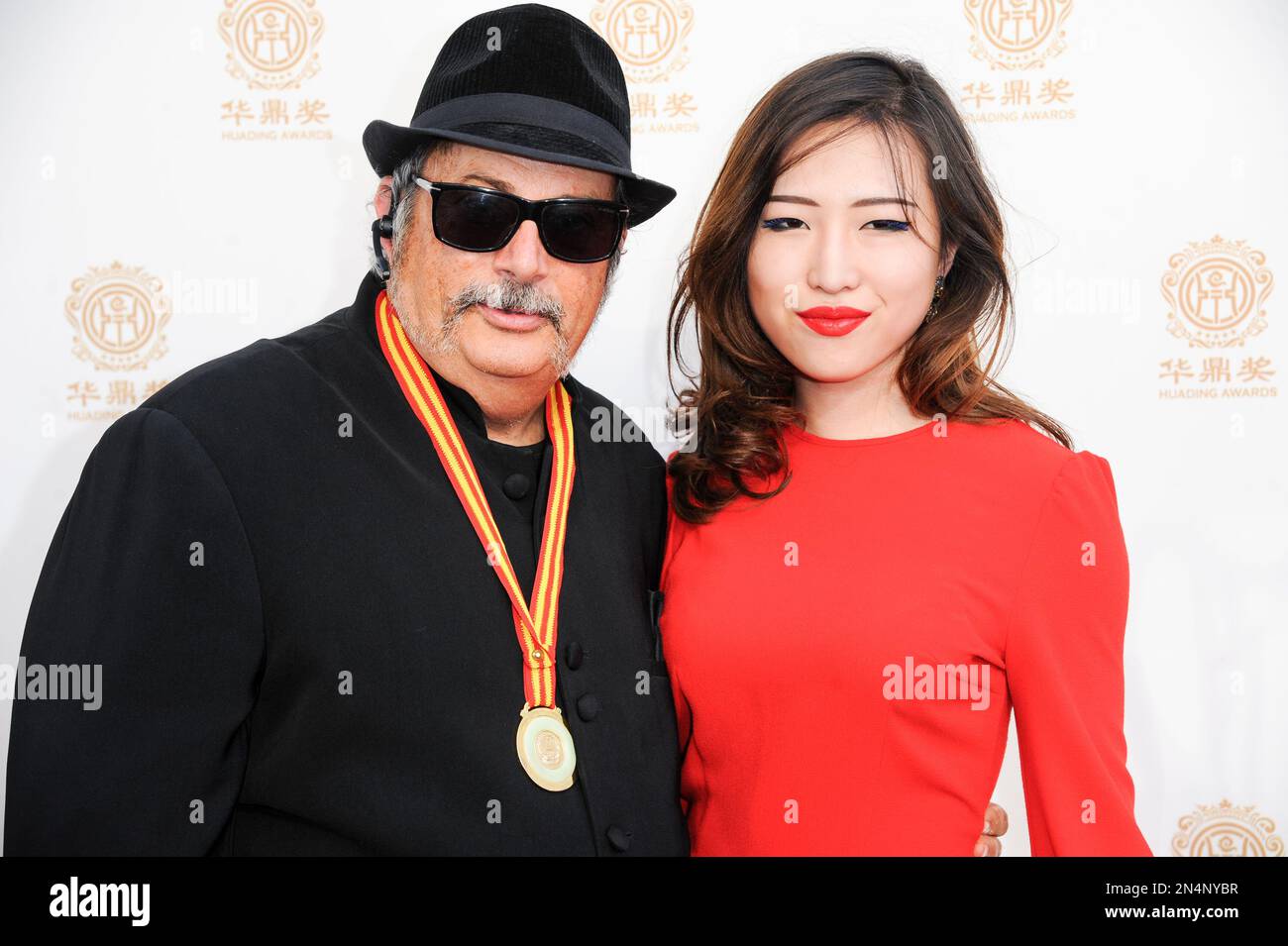 Robert King, left, and Joss Fu arrive at the Huading Film Awards held ...