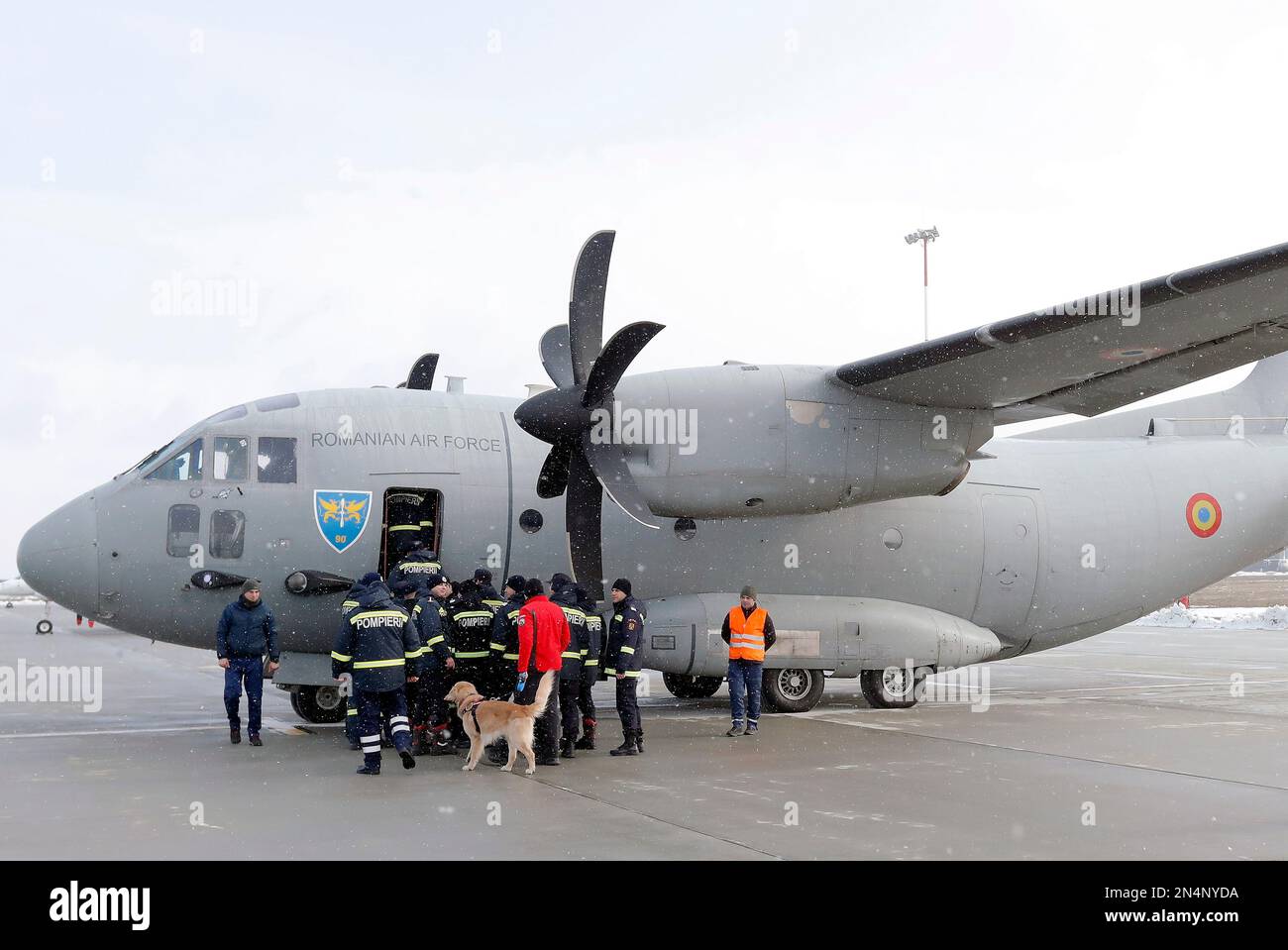 Otopeni, Romania. 8th Feb, 2023. A Romanian rescue team boards a C-27J ...