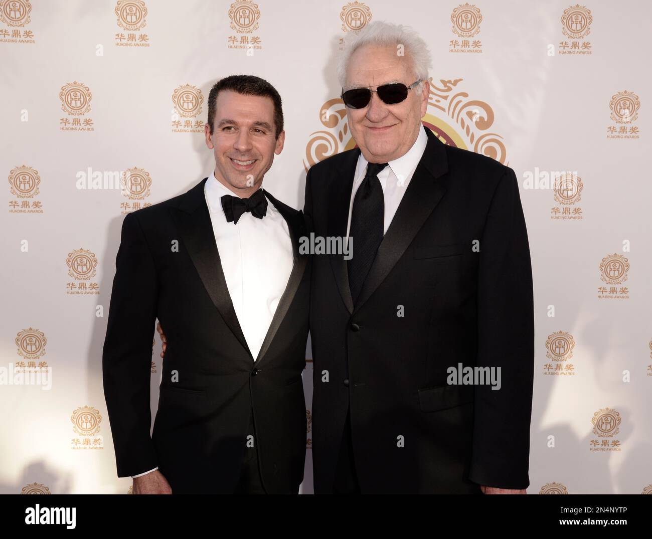 Charlie Haykel, left, and Don Mischer arrive at the Huading Film Awards ...