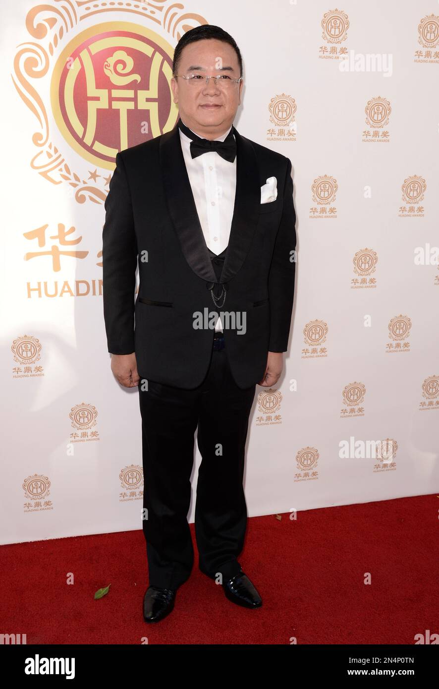 Chairman of Global Talents Media Group Wang Kun arrives at the Huading ...
