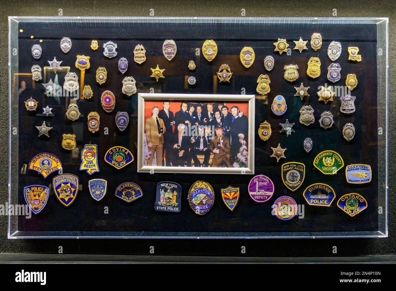 Display of Elvis Presley’s police badges and patches in the Trophy ...