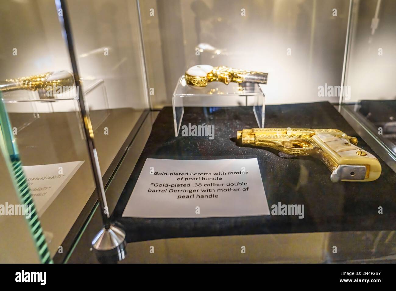 Elvis Presley’s gold guns on display in the Ultimate Lounge for VIPs at ...