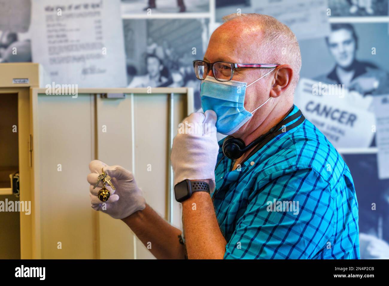 Visitor holds the keys to Elvis Presley’s Cadillac during a VIP Tour at ...