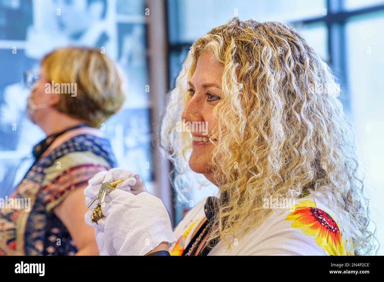 Visitor holds the keys to Elvis Presley’s Cadillac during a VIP Tour at ...