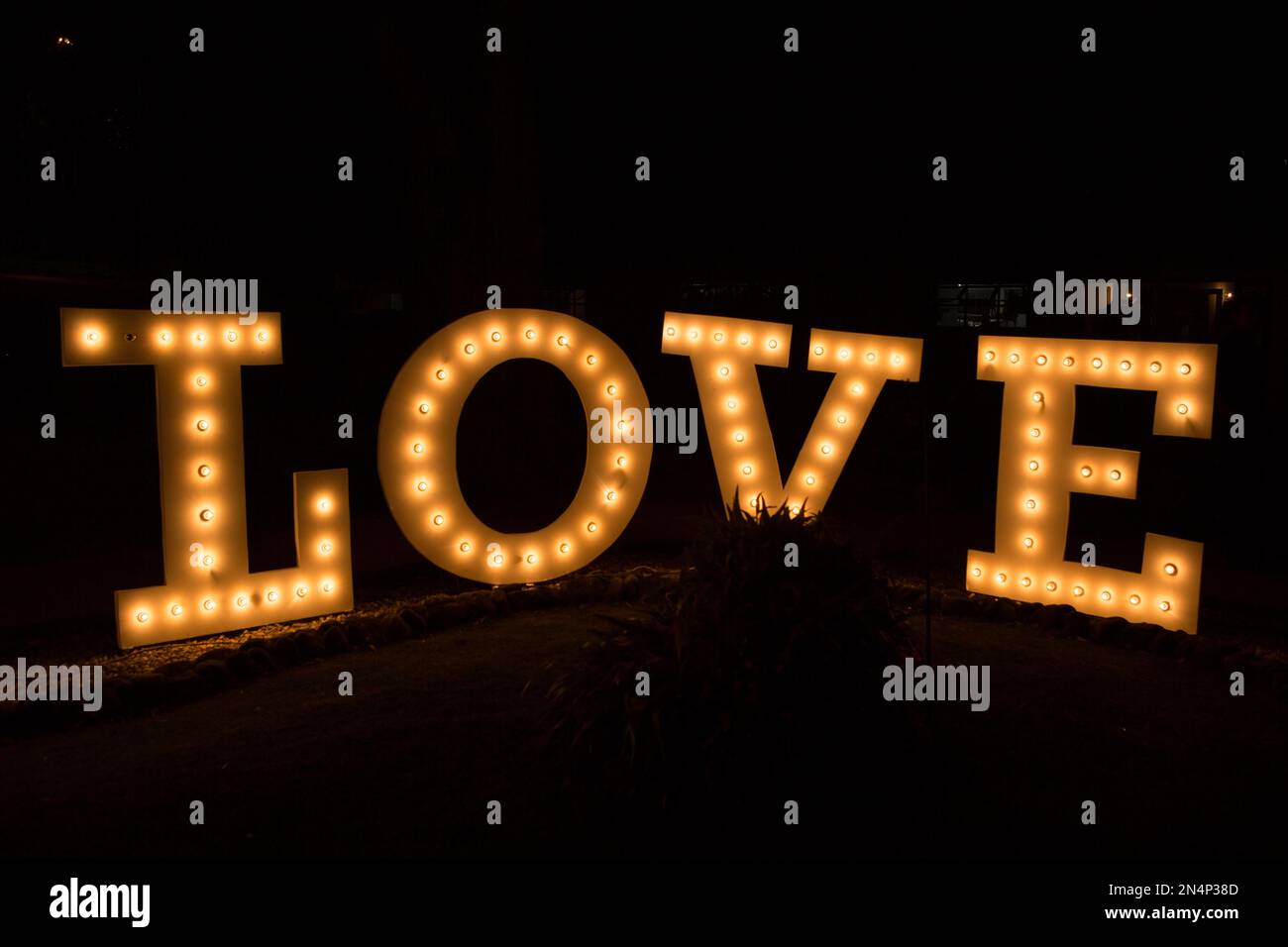 Love Words Formed With Lights Stock Photo - Alamy