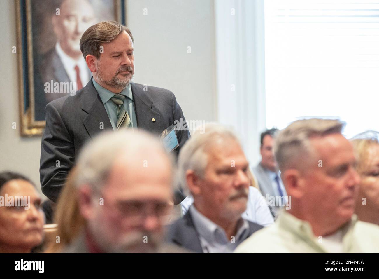 FBI electronics engineer Dwight Falkofske walks to the stand during ...