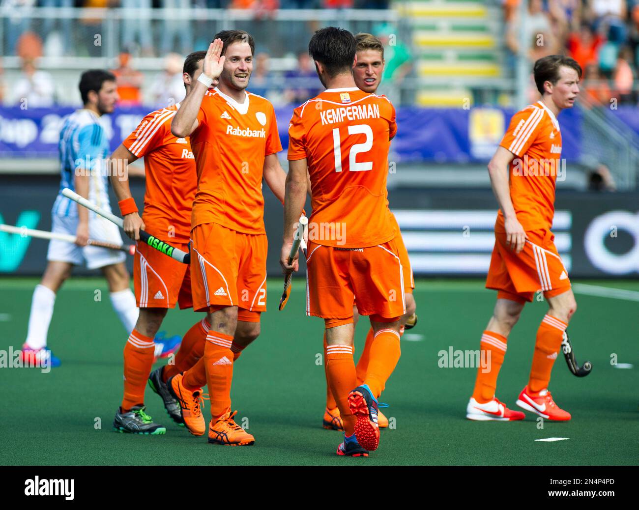 The Netherlands' team cheers after their third goal, made by Rogier ...