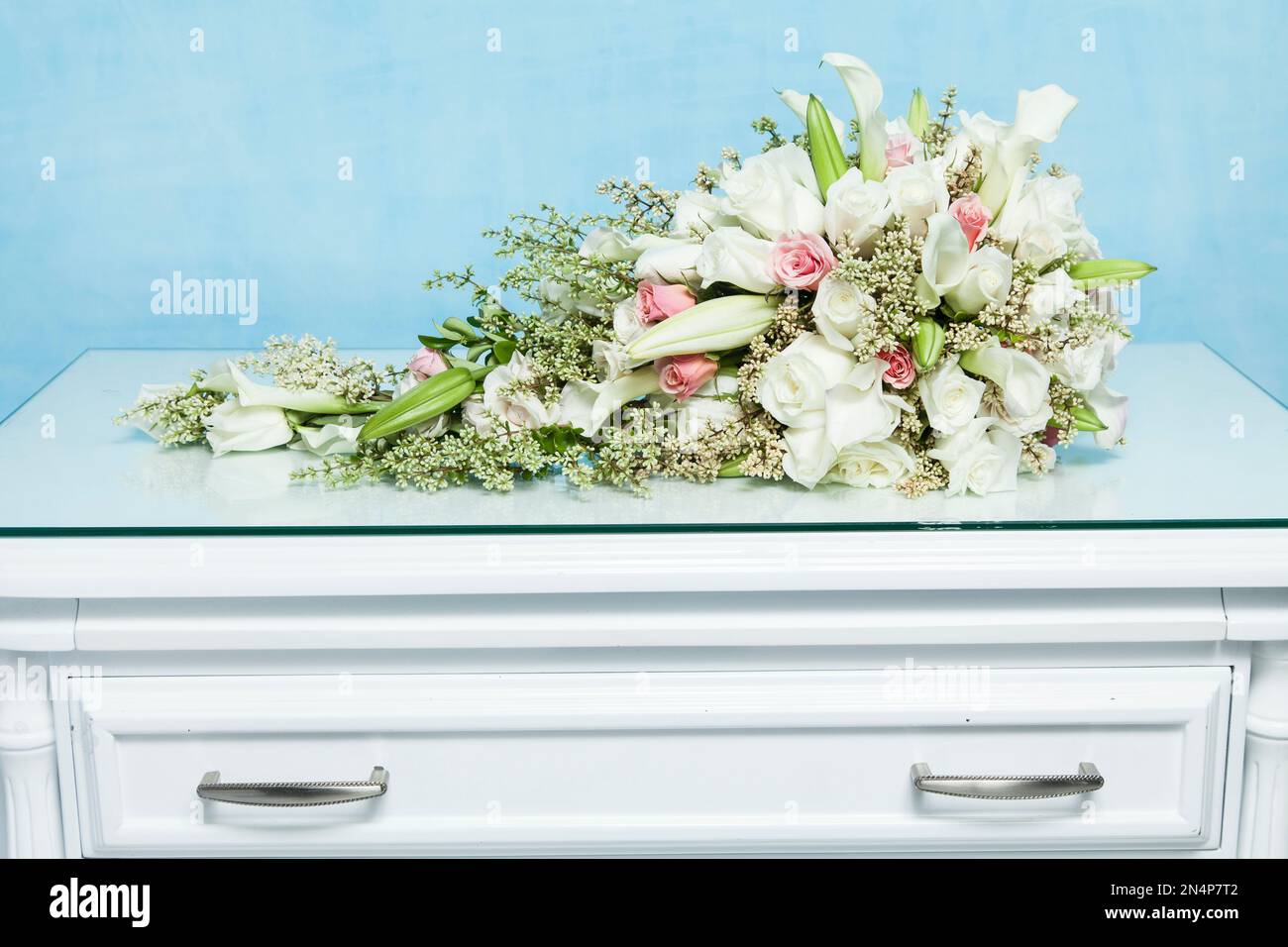 Bouquet of flowers on the nightstand Stock Photo - Alamy