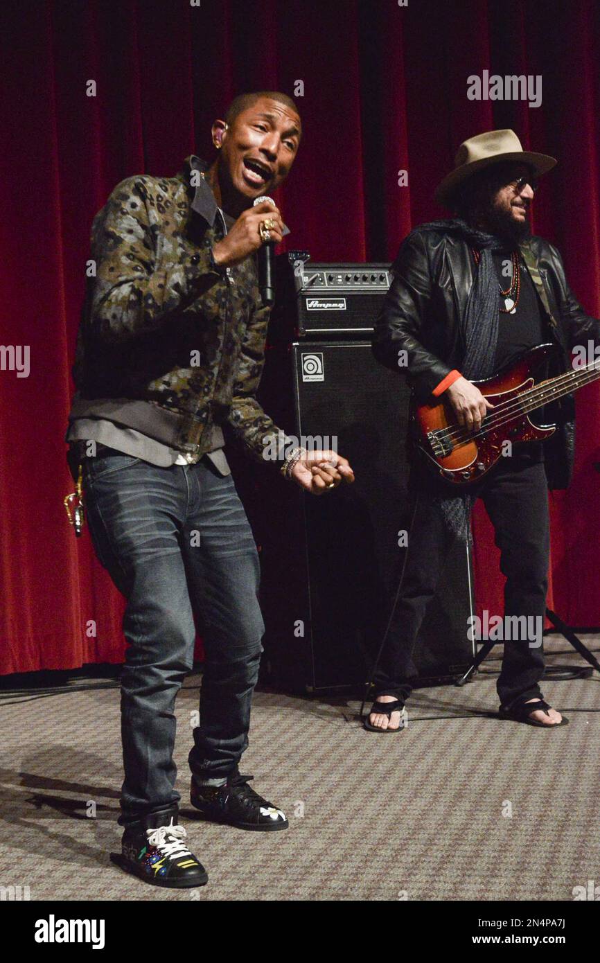 Pharrell Williams, left, and Don Was perform during the GRAMMY Event ...