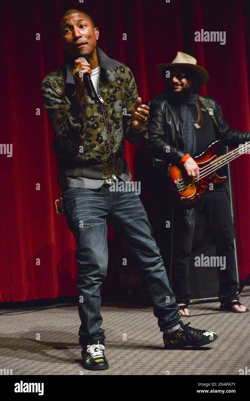 Pharrell Williams, left, and Don Was perform during the GRAMMY Event ...