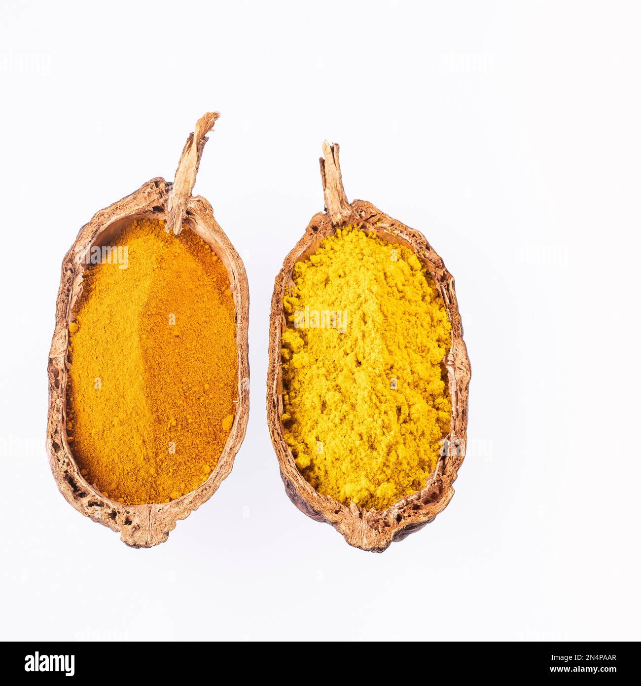 Organic turmeric seasonings and curry in bowls - Curcuma longa Stock ...