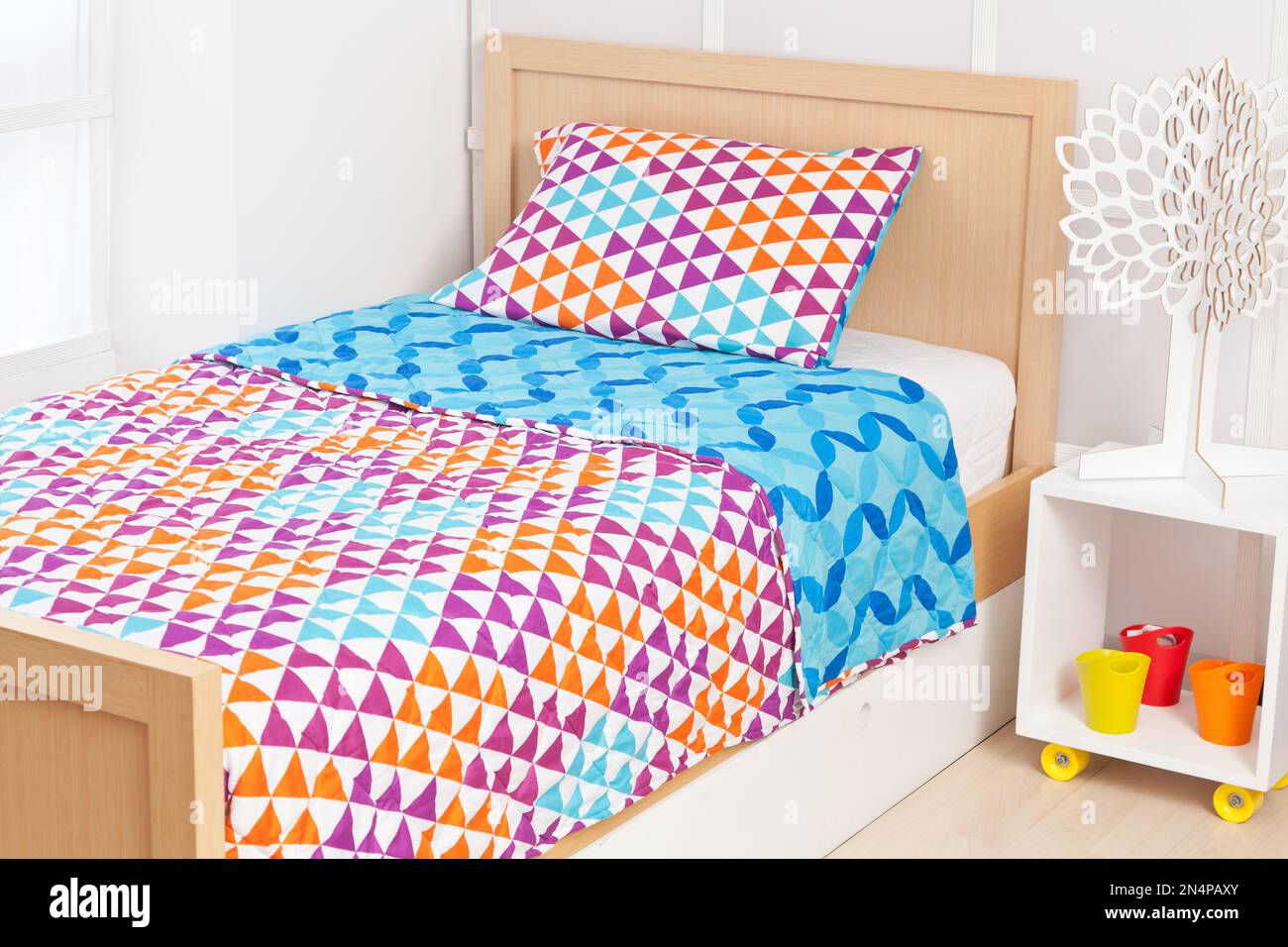 Modern bedding set with geometric shapes Stock Photo - Alamy