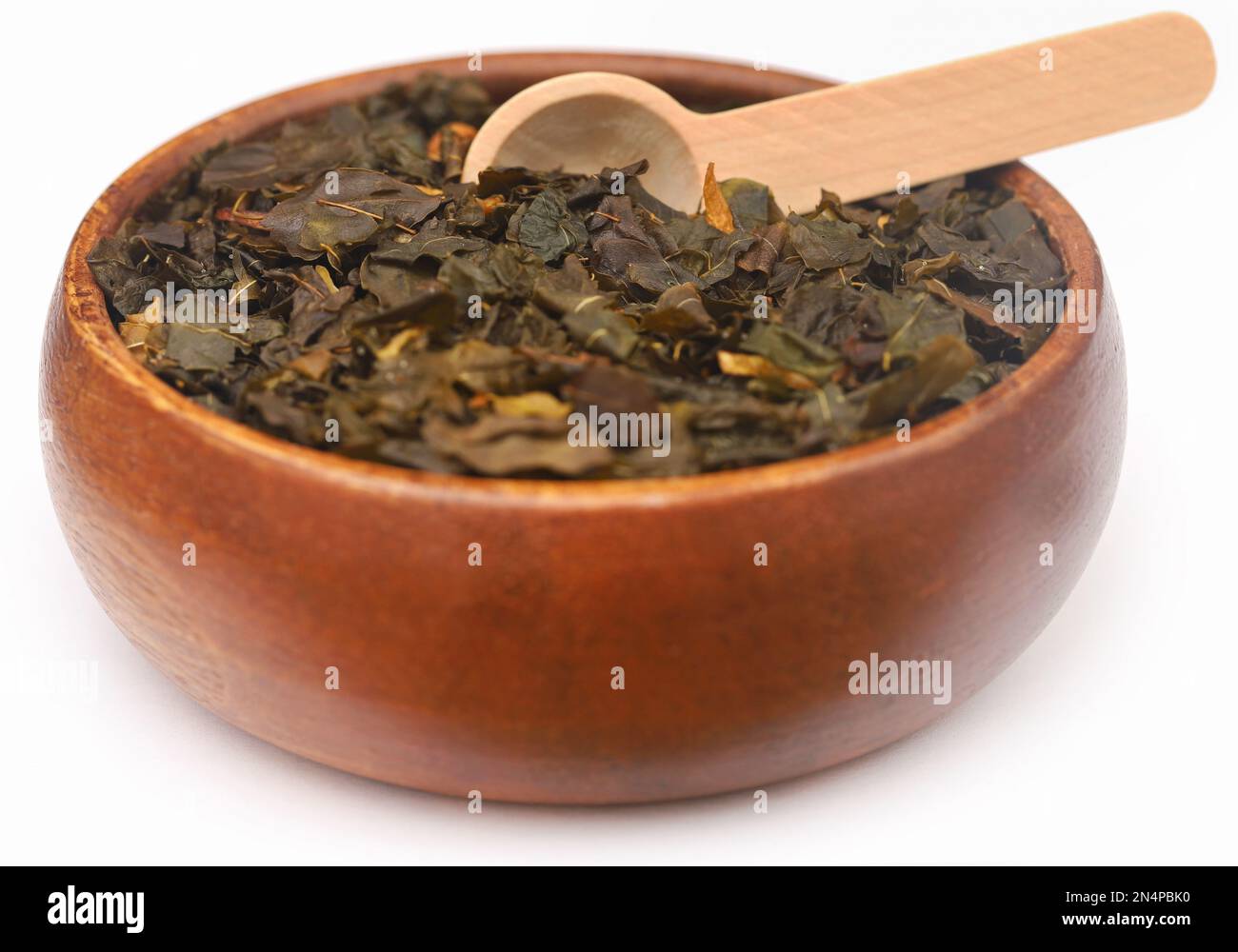 Fried moringa leaves over white background Stock Photo - Alamy