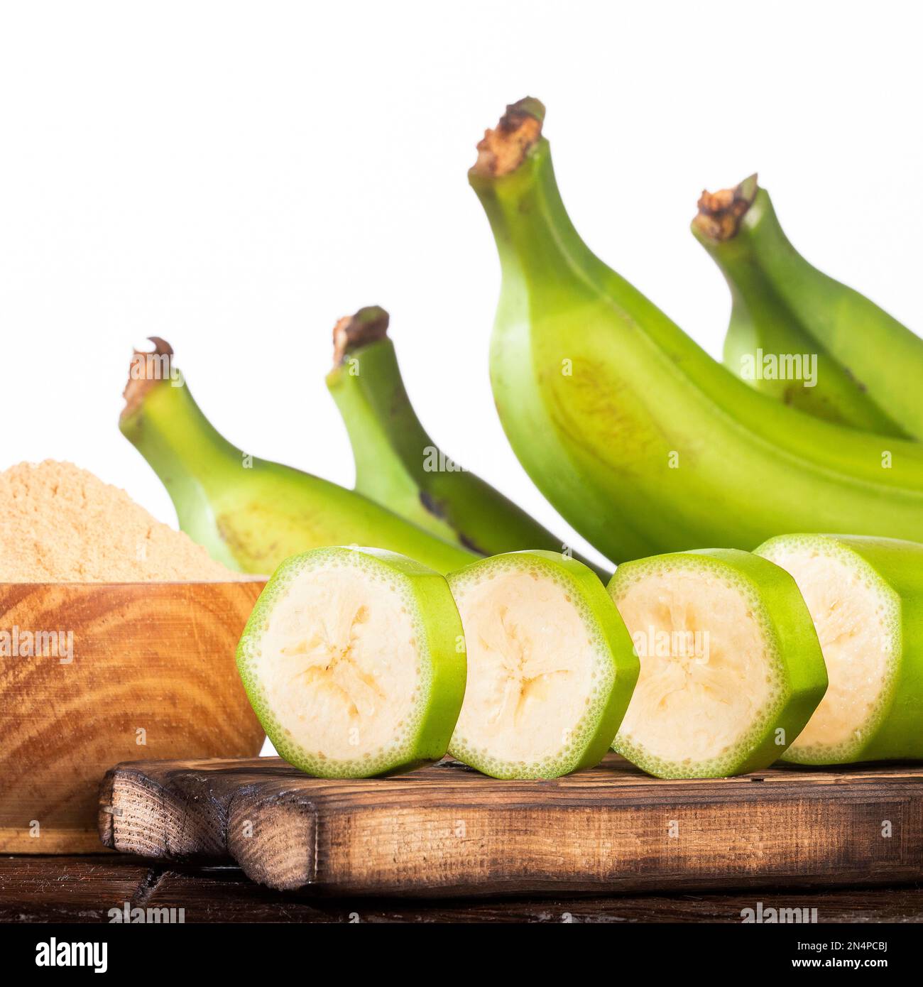 Organic green banana starch in the bowl Stock Photo - Alamy