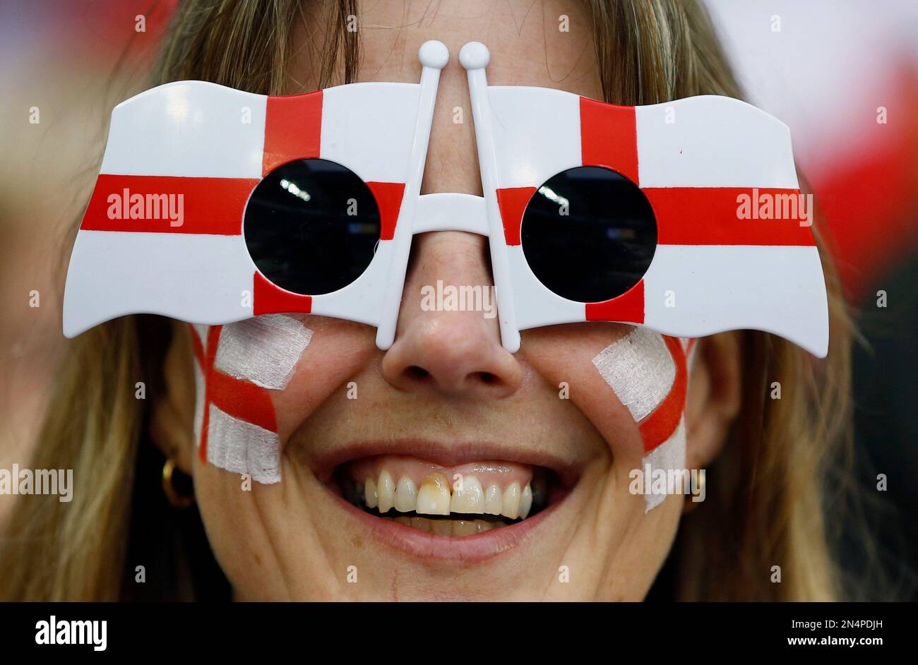 An England supporter smiles, ahead of the international friendly soccer ...