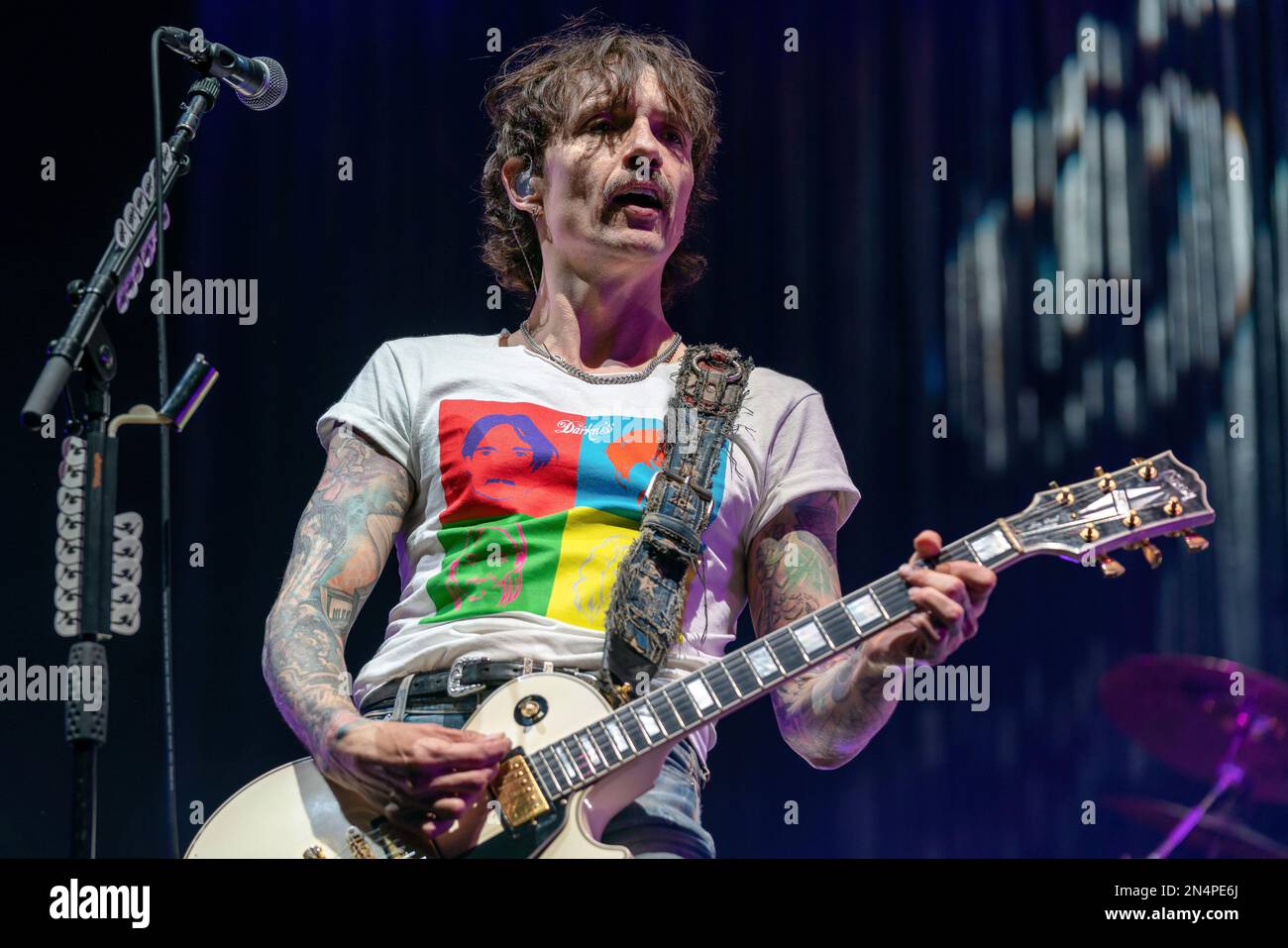 Justin Hawkins of The Darkness on stage at OVO Arena with guitar ...
