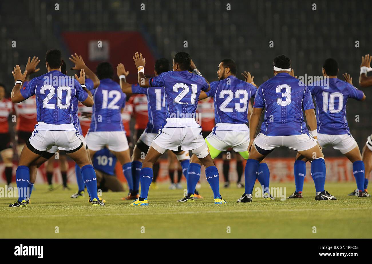 Samoa's team players perform "haka," traditional war cry, before their ...