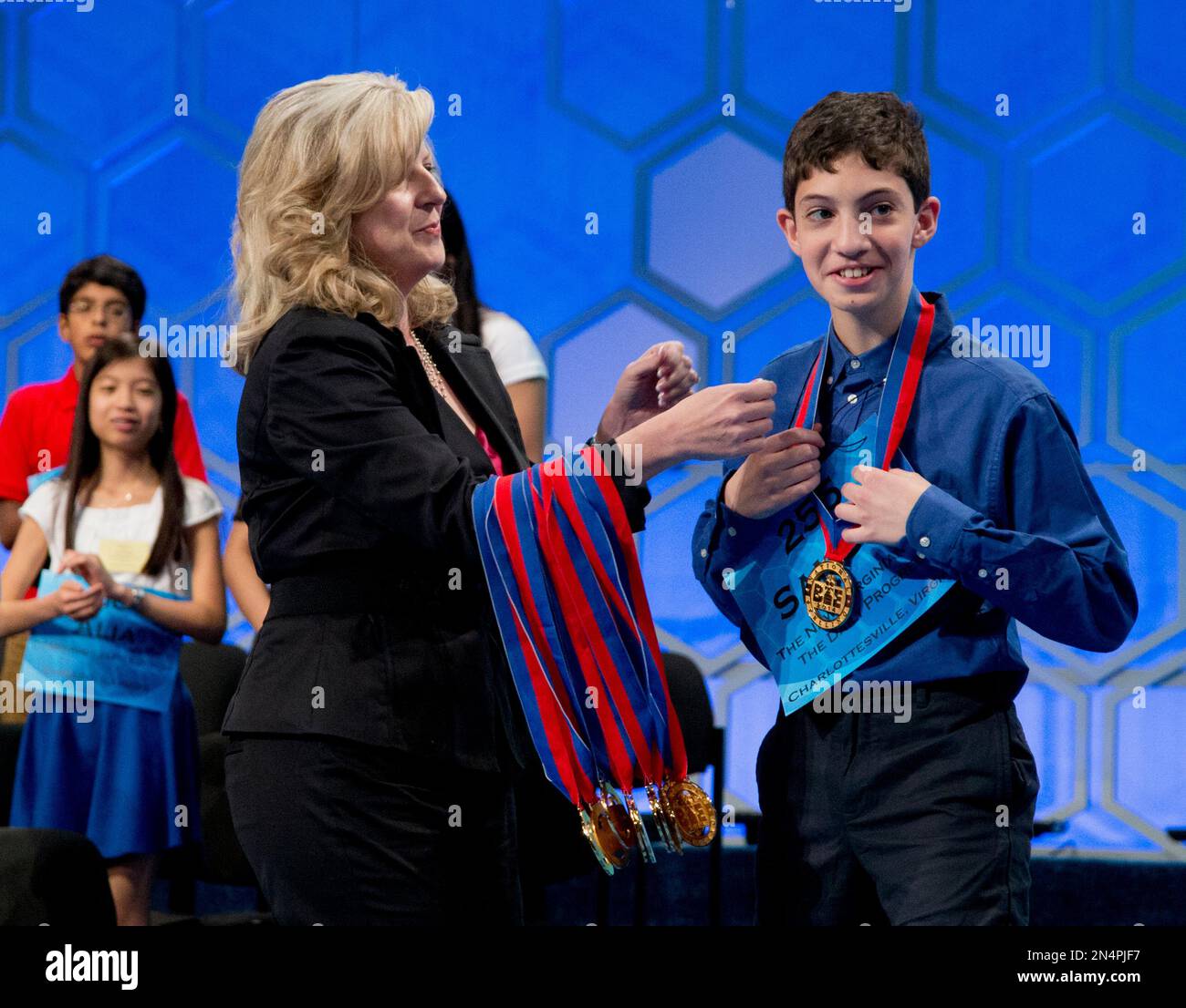 Finalist Samuel Pereles, 13 of Waynesboro, Va., is congratulated by ...